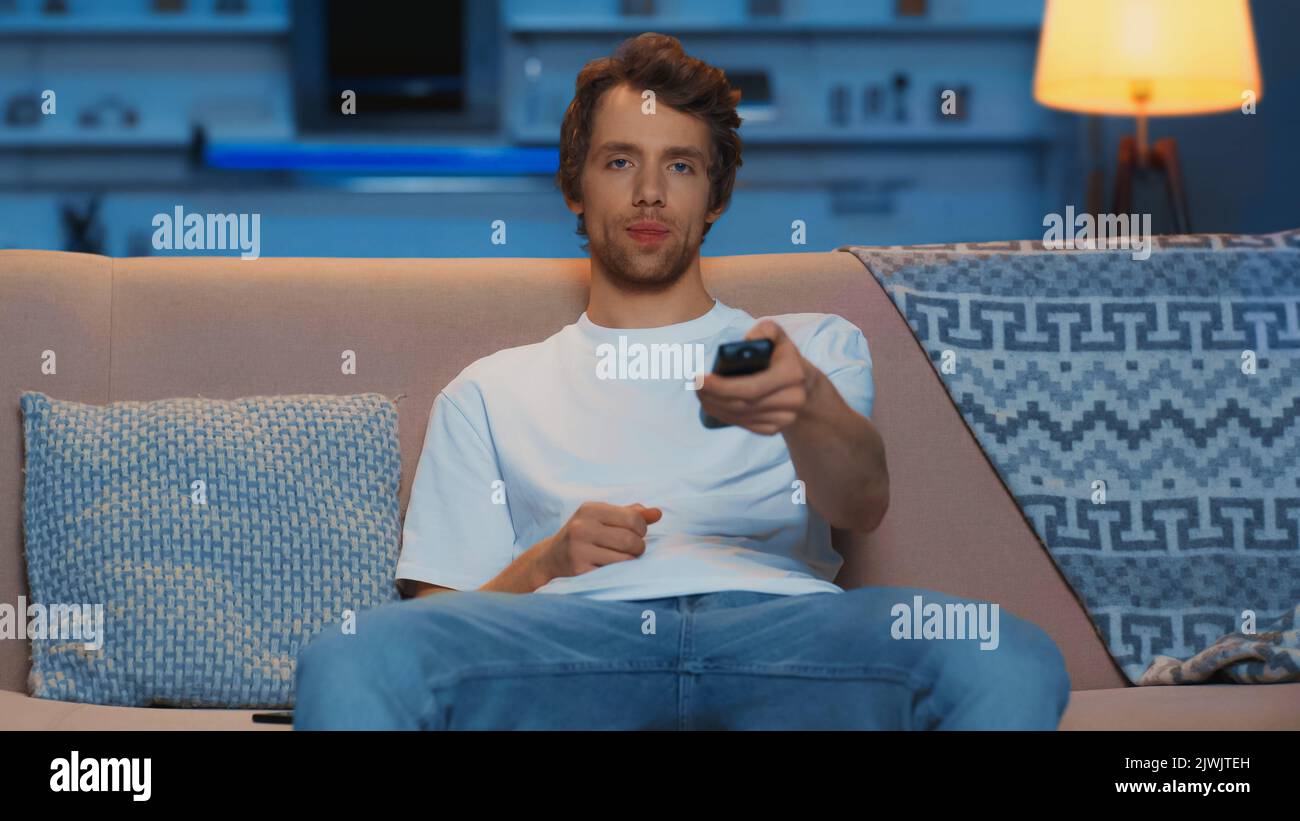 Man using remote controller hi-res stock photography and images - Alamy