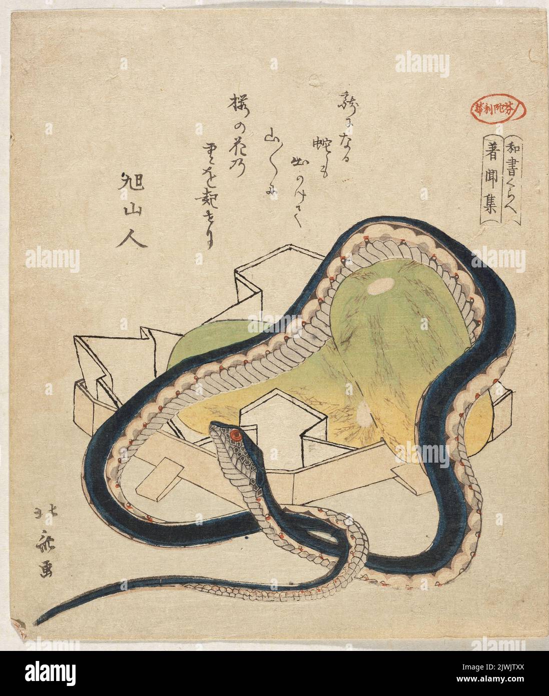 Snake curled around watermelons in a box decorated with folded paper ...