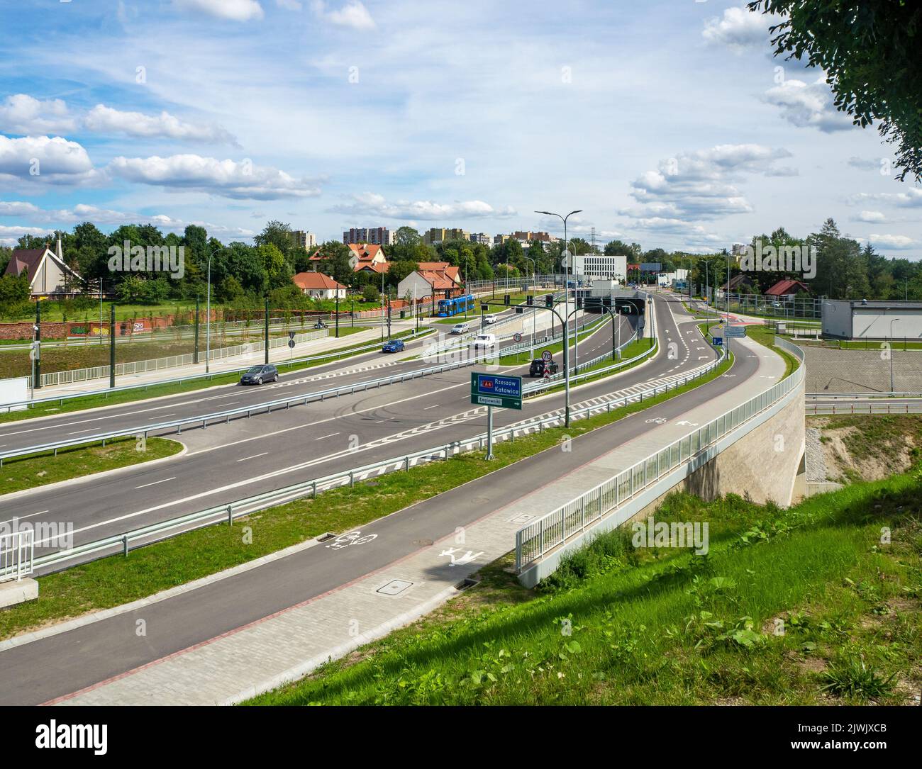 New city highway with tunnels and tramway in Krakow, Poland Stock Photo ...