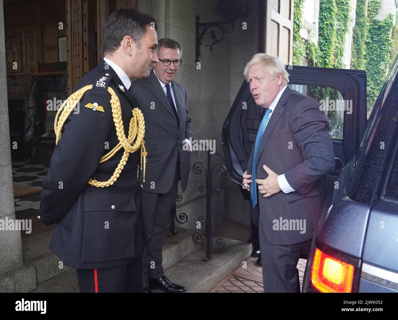 Outgoing Prime Minister Boris Johnson is greeted by the Queen Elizabeth ...