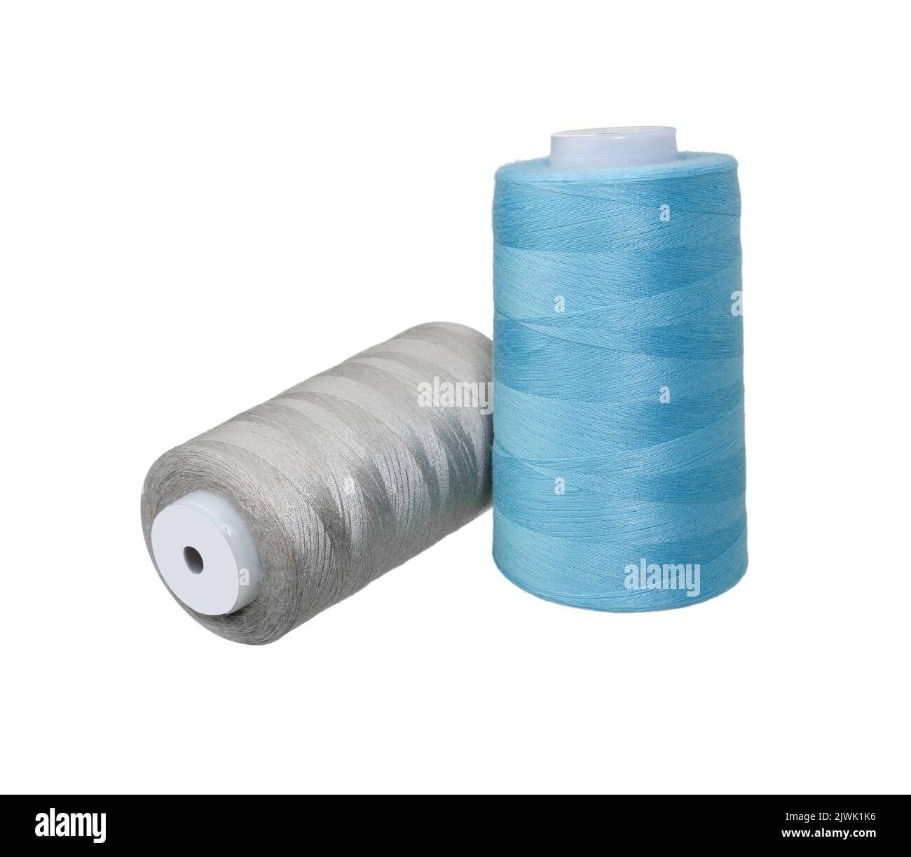 Sewing thread spool of colors isolated on white Stock Photo - Alamy