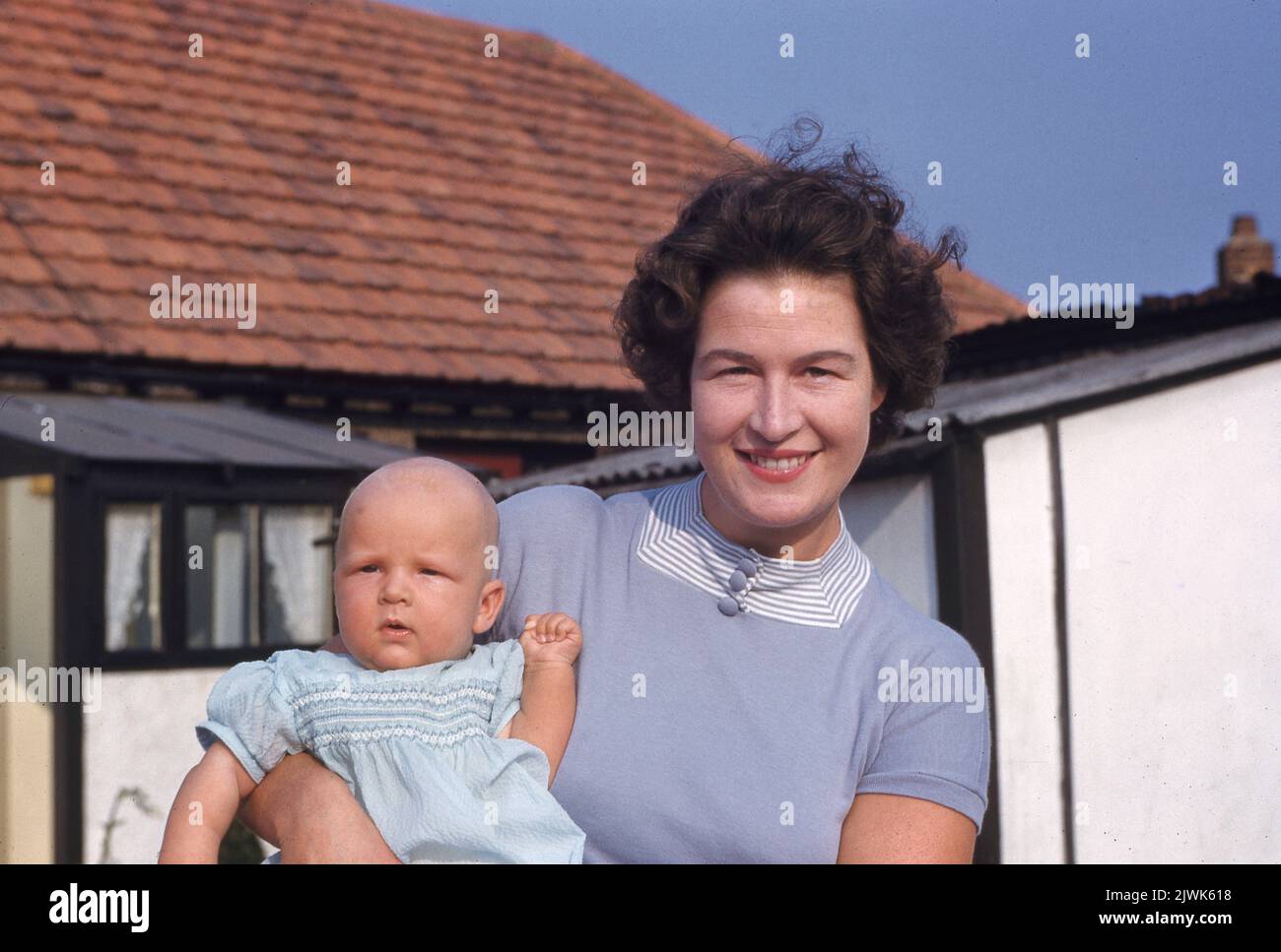A stunning quality double protrait of a mother and baby c1960. Photo by ...
