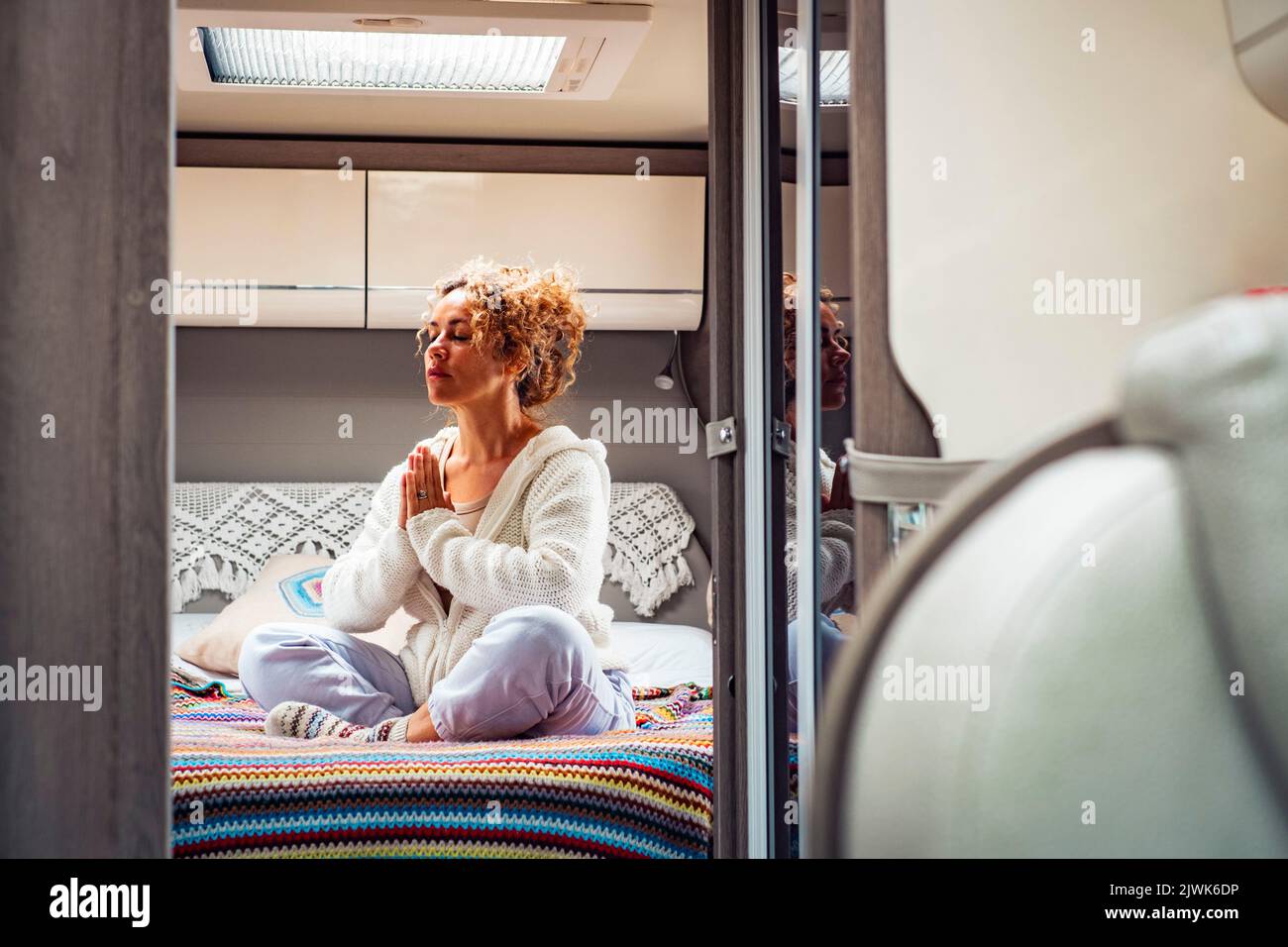 Zen and meditation indoor leisure activity. One woman in yoga relax ...