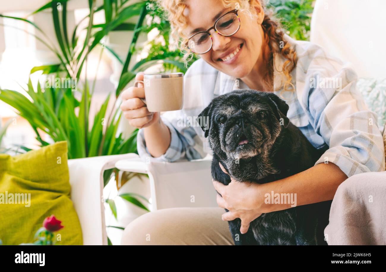 Animal dog best friend together concept with happy young woman owner ...