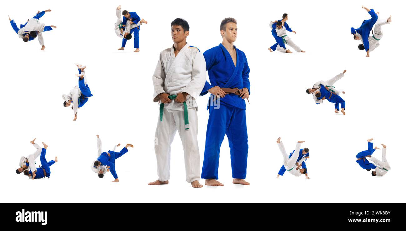 Studio shot of two men, professional judo, karate athletes training ...