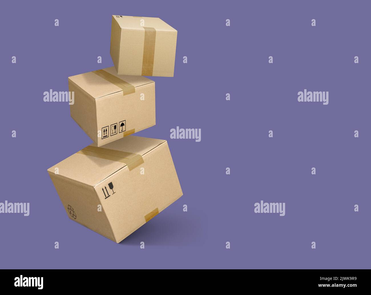 Closed and taped cardboard parcel boxes falling on violet background ...