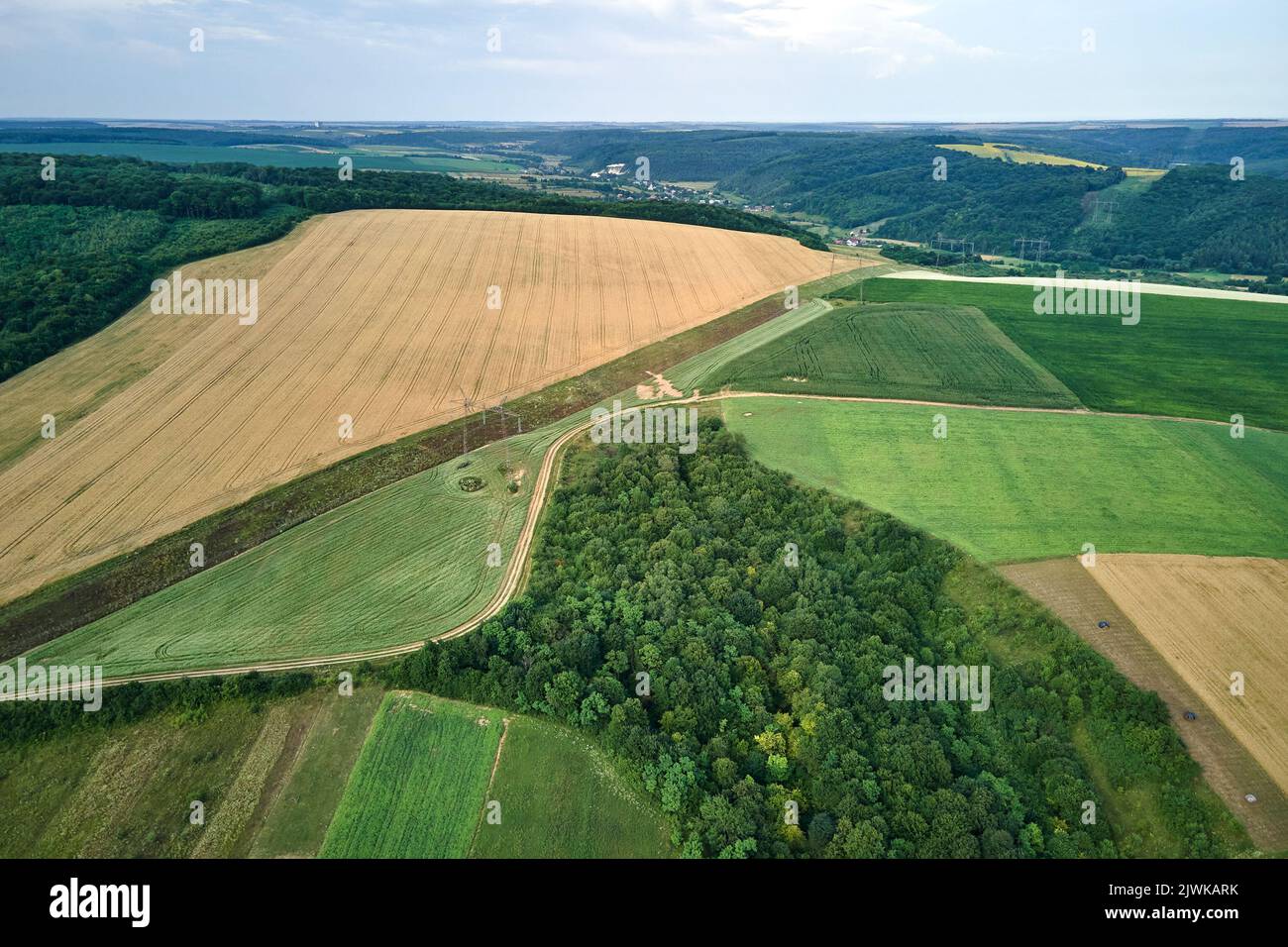 Aerial landscape view of green and yellow cultivated agricultural ...