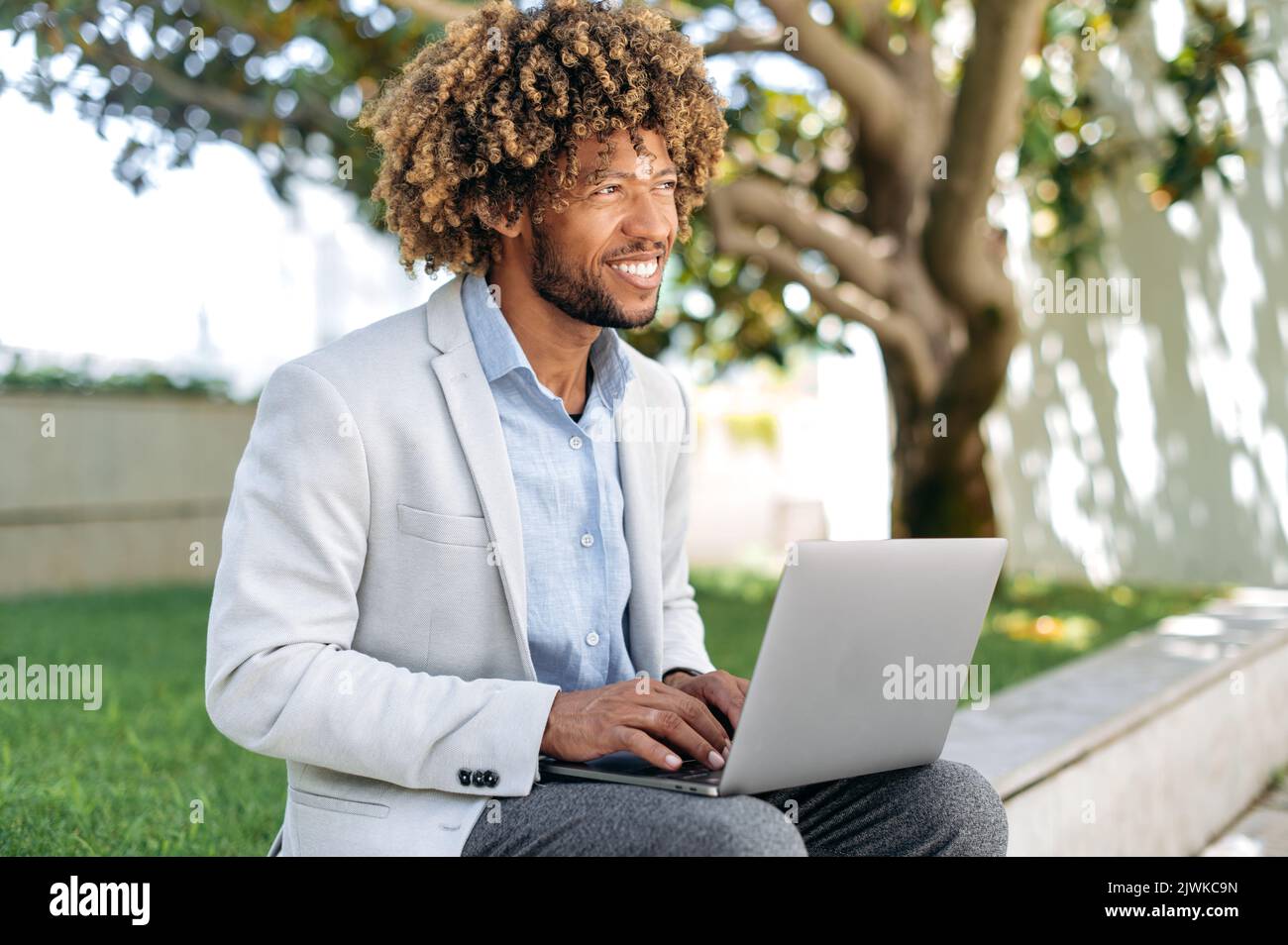 Pensive man working remotely on hi-res stock photography and images - Alamy