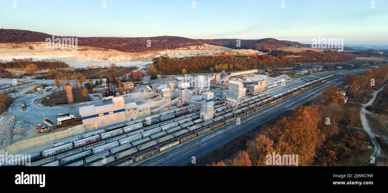 Aerial view of cargo train loaded with crushed sandstone materials at ...