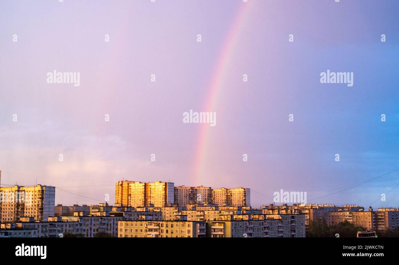 Rainbow over multi-storey residential buildings in the residential area ...