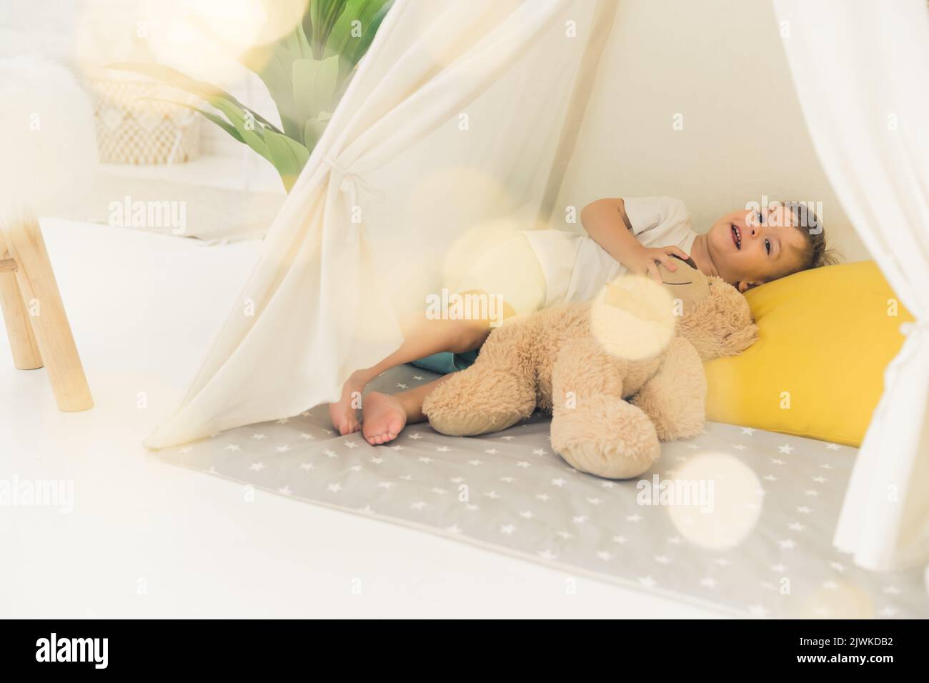 Modern childhood concept. Adorable European brown-haired casually ...