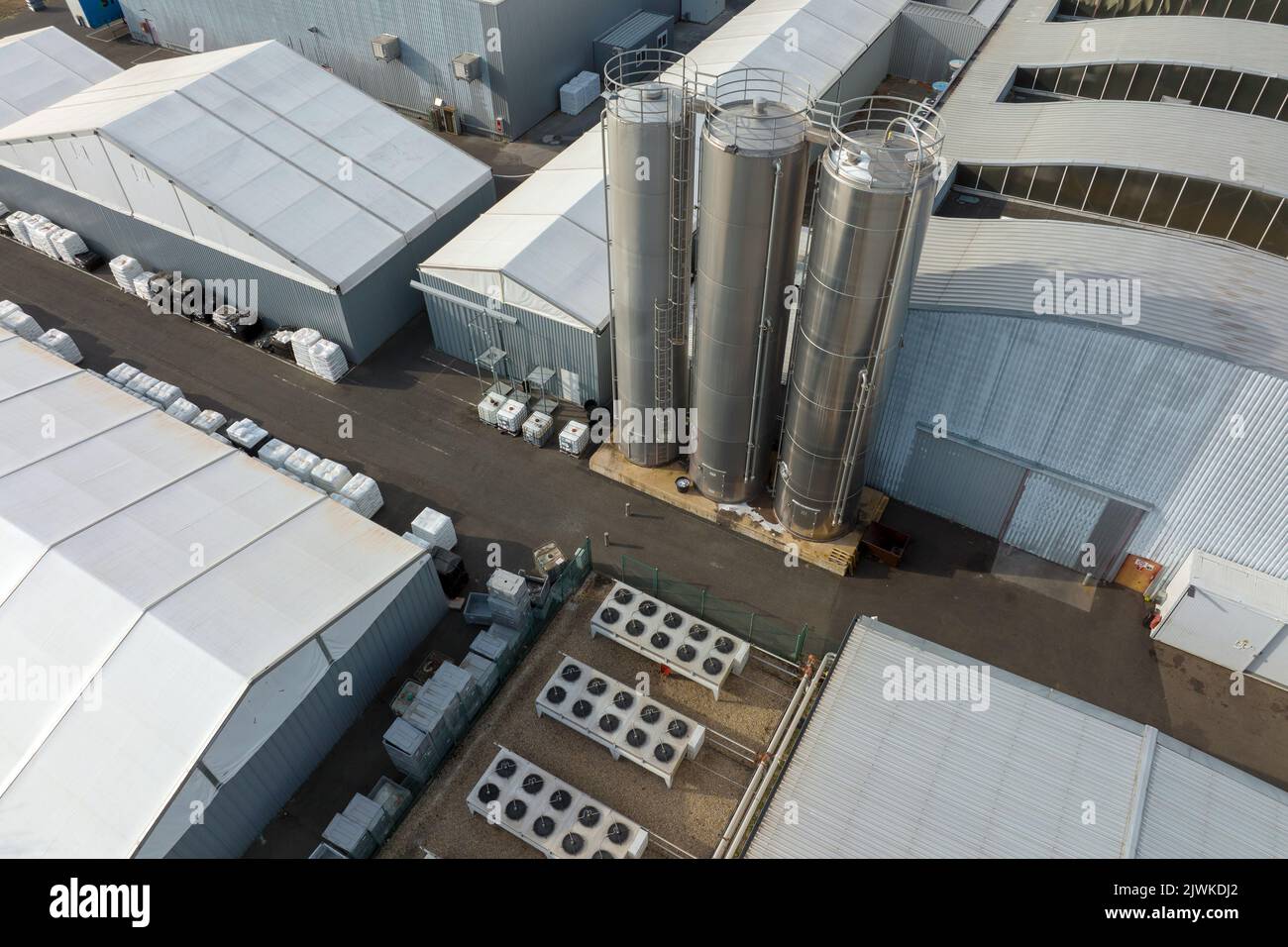Aerial view of modern factory structure for production and distribution ...
