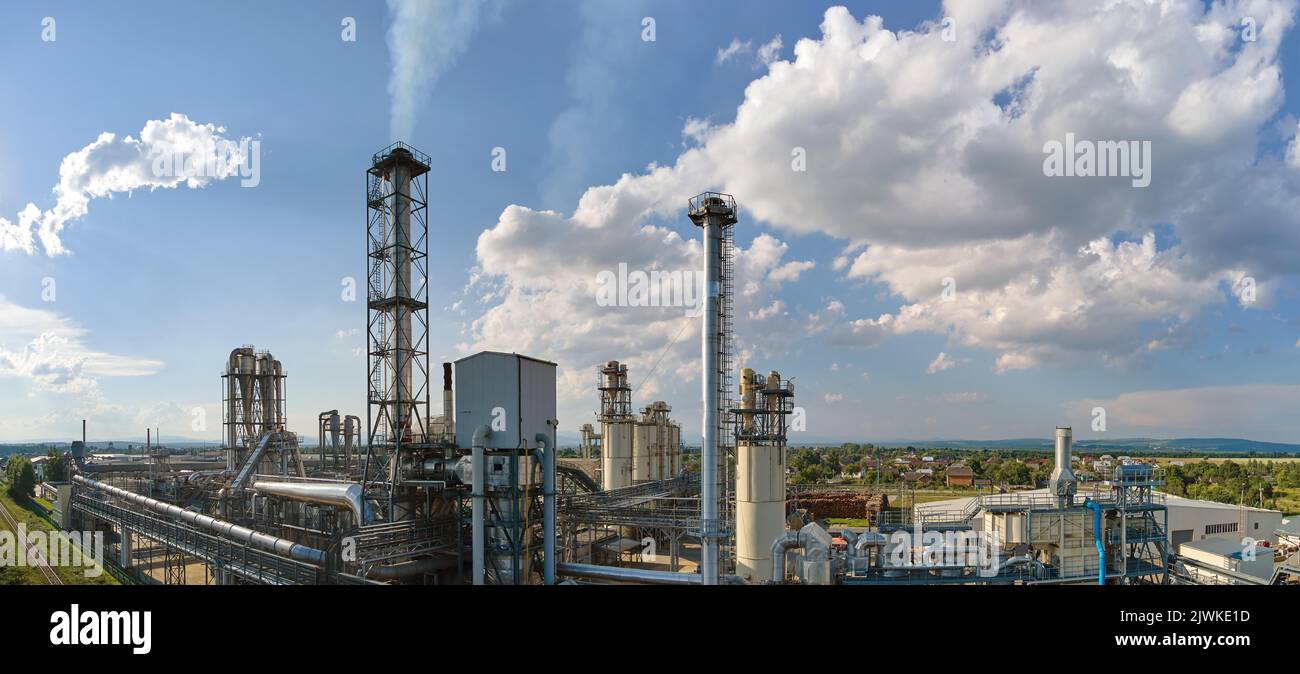 Aerial view of oil and gas refining petrochemical factory with tall ...