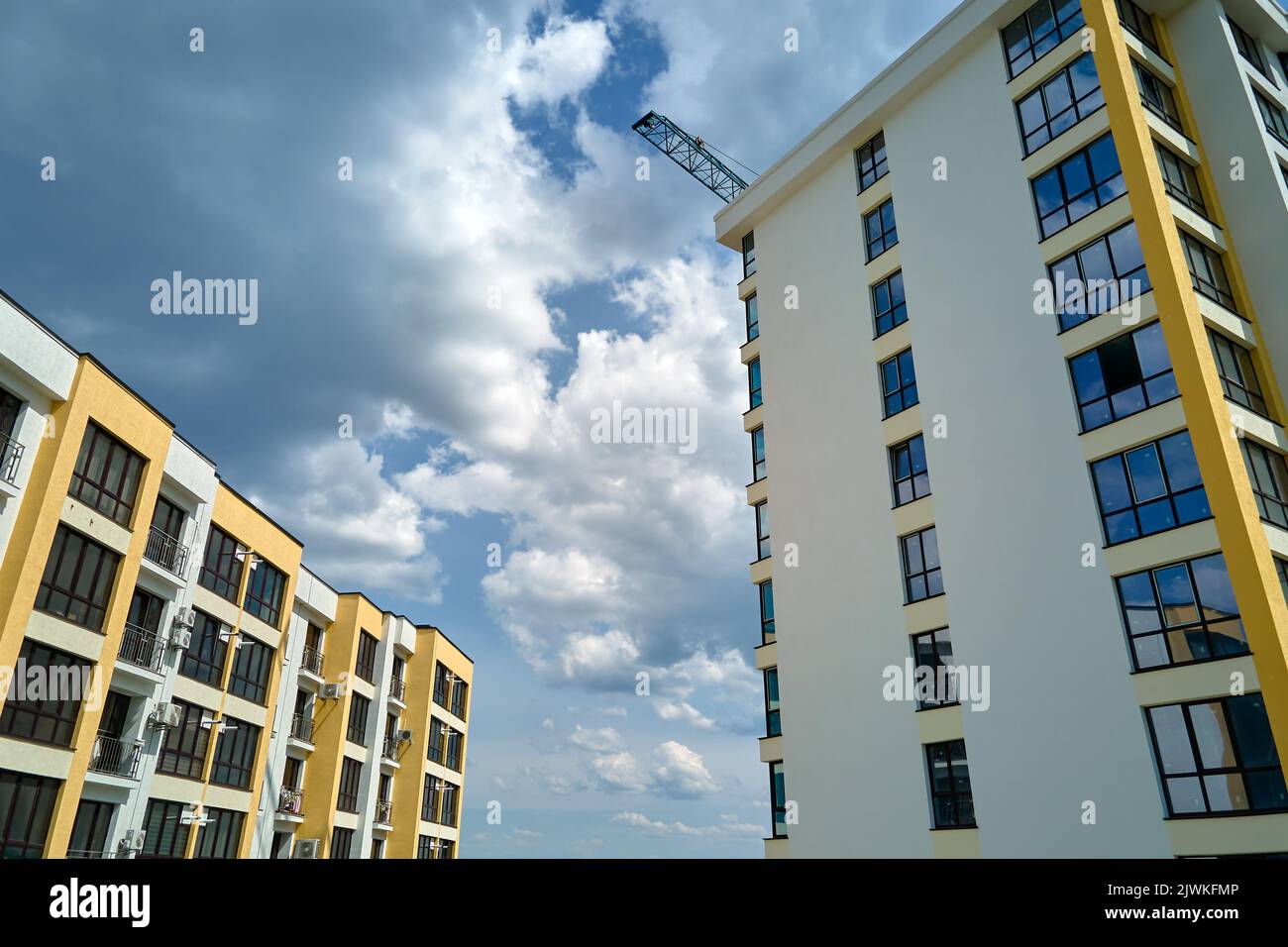 Architectural details of modern high apartment building facade with ...