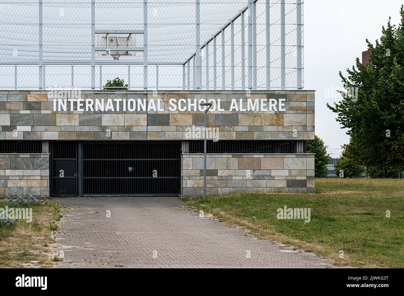 Almere, Flevoland, The Netherlands, 07 20 2022 - Facade and playground ...