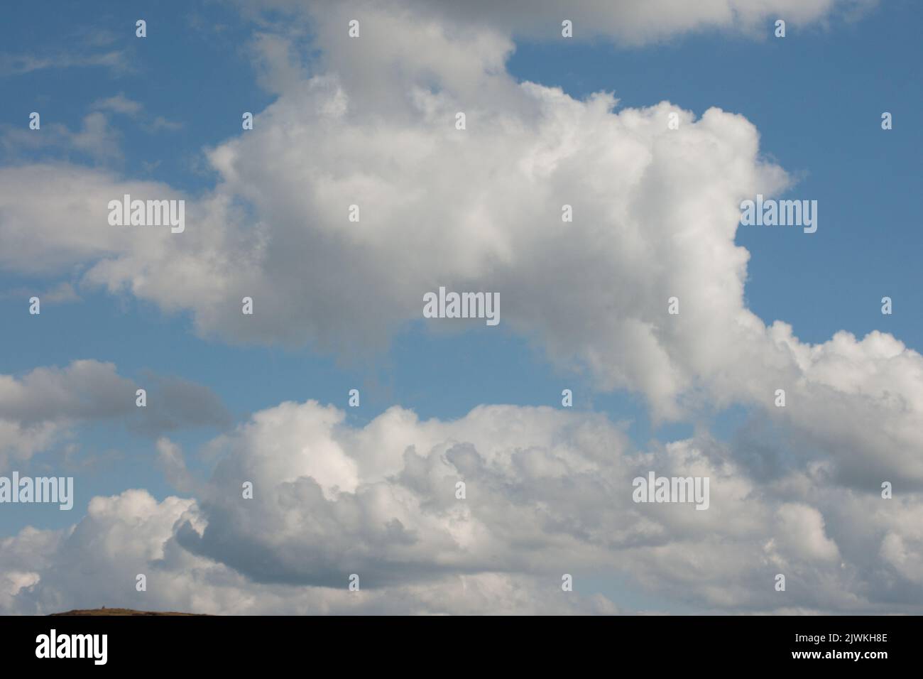 Fluffy cloud shapes hi-res stock photography and images - Alamy