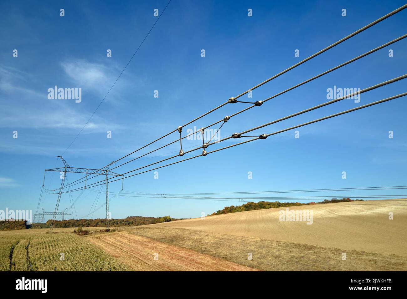Electric power lines divided by safe guard insulating frame transfening ...