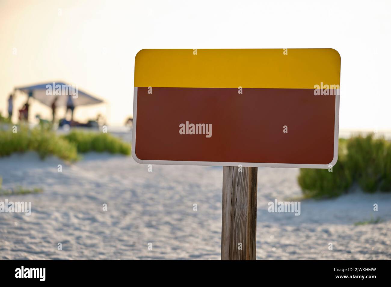 Empty signboard with copy space on seaside beach with small sand dunes ...