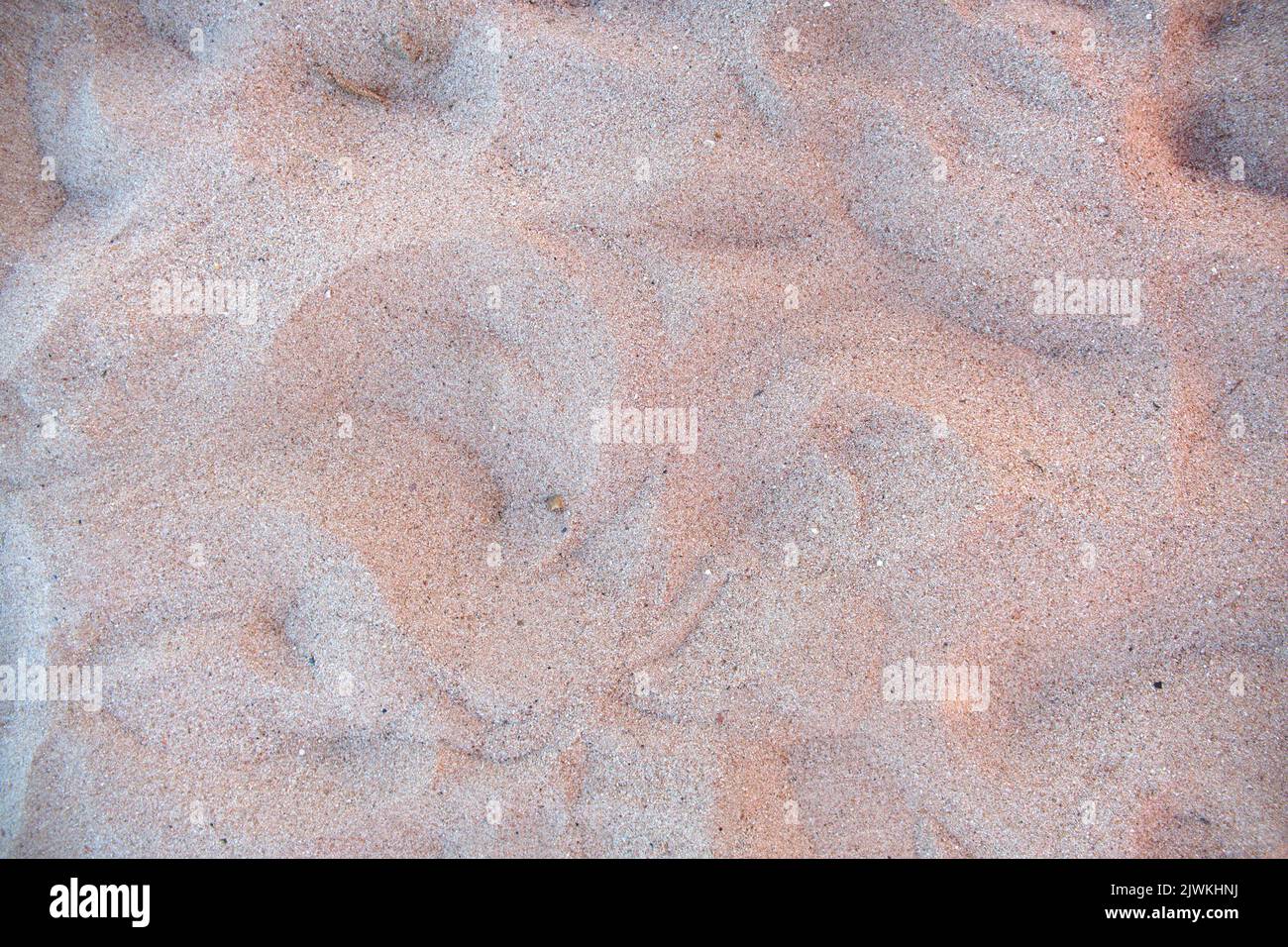 Flat view of clean yellow sand surface covering seaside beach. Sandy ...