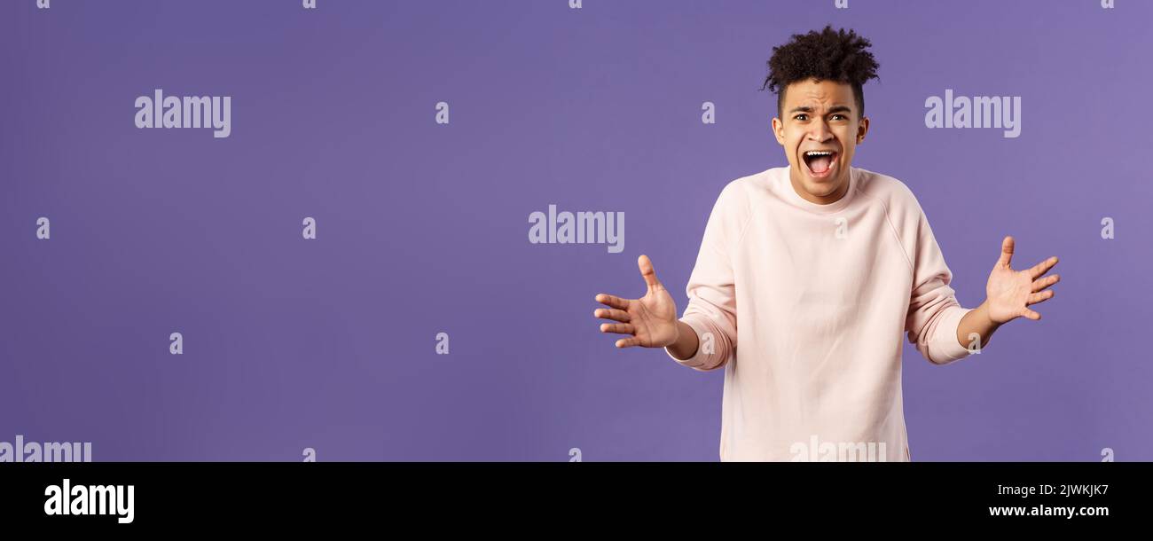 Portrait of concerned, upset and frustrated young man cant believe he ...