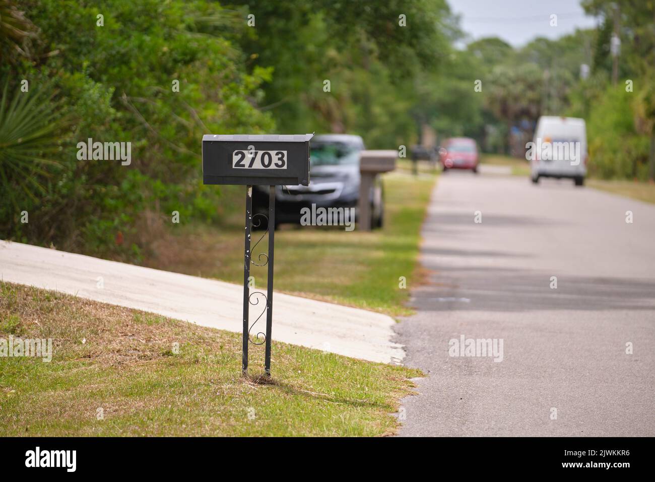 Typical american outdoors mail box on suburban street side Stock Photo ...