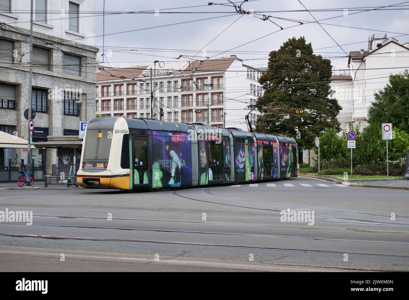 Modern tram in Milan. Milan transportation system carries 2 million ...