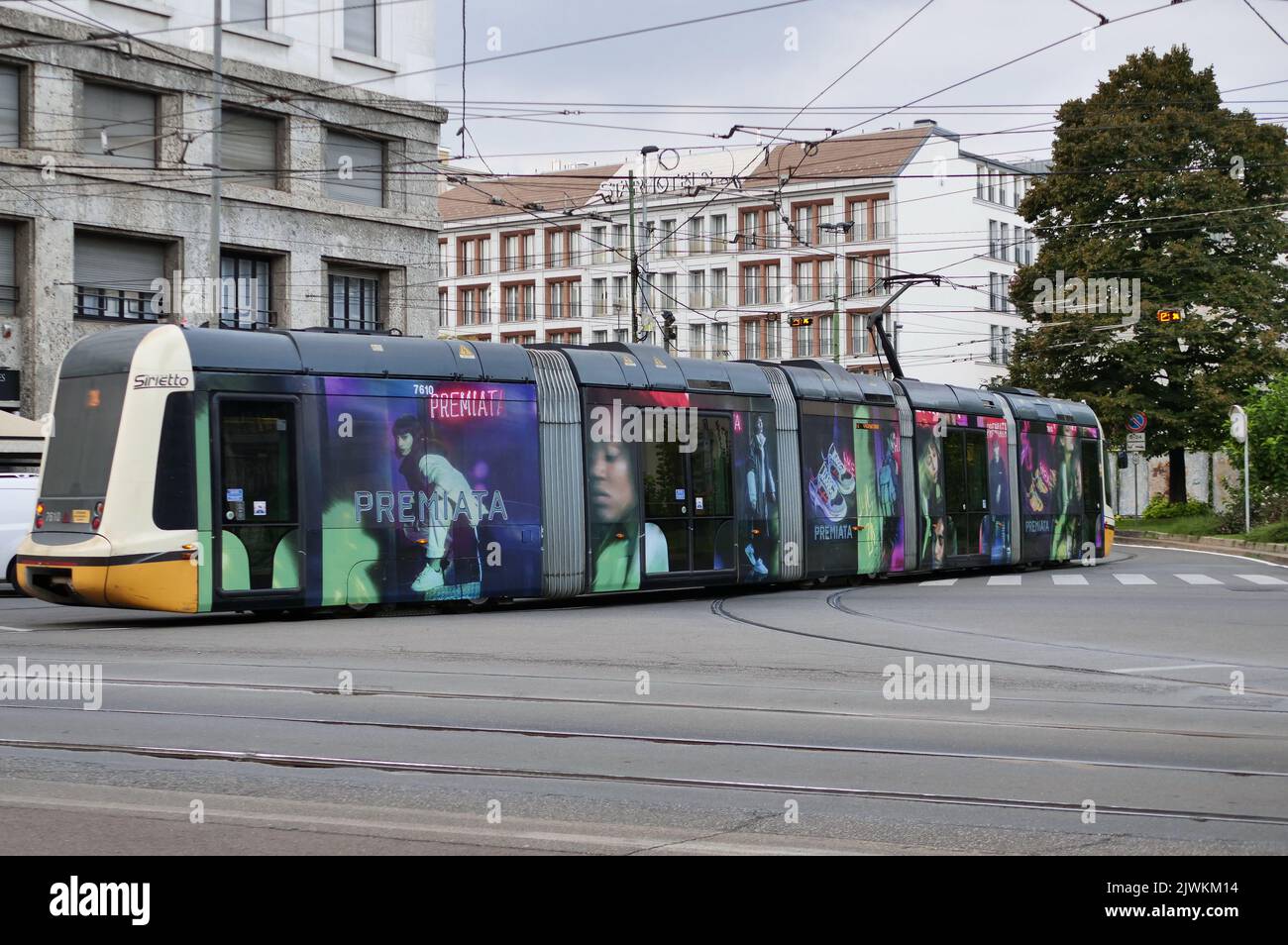 Modern tram in Milan. Milan transportation system carries 2 million ...