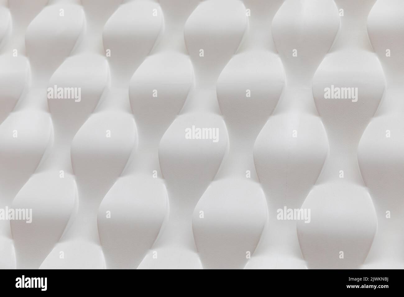 textured ceramic tile surface with bubbles of white color close-up ...