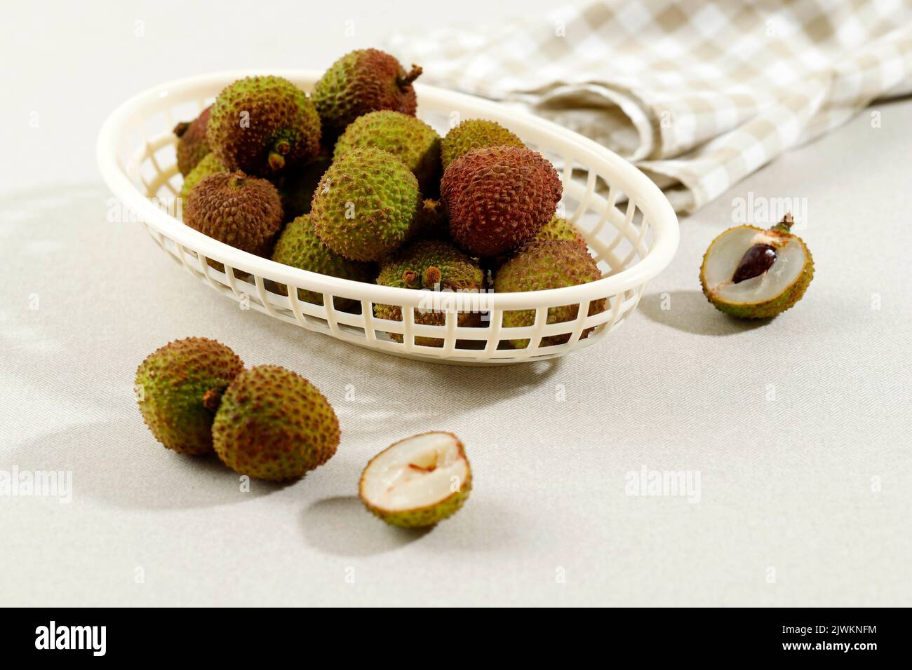 Green Lyche on a Basket, Copy Space for Text Stock Photo - Alamy