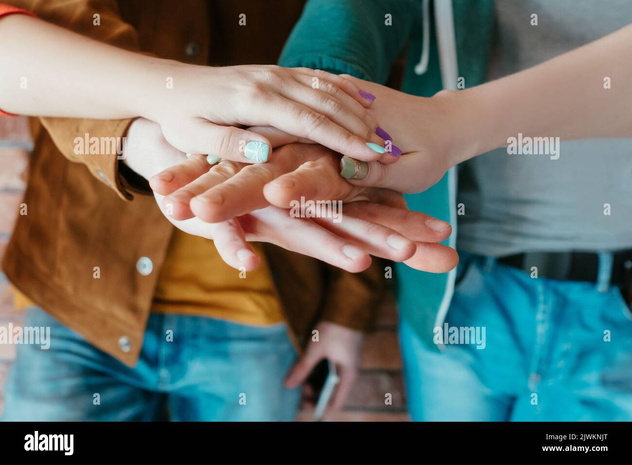 team unity hands together collaboration teamwork Stock Photo - Alamy
