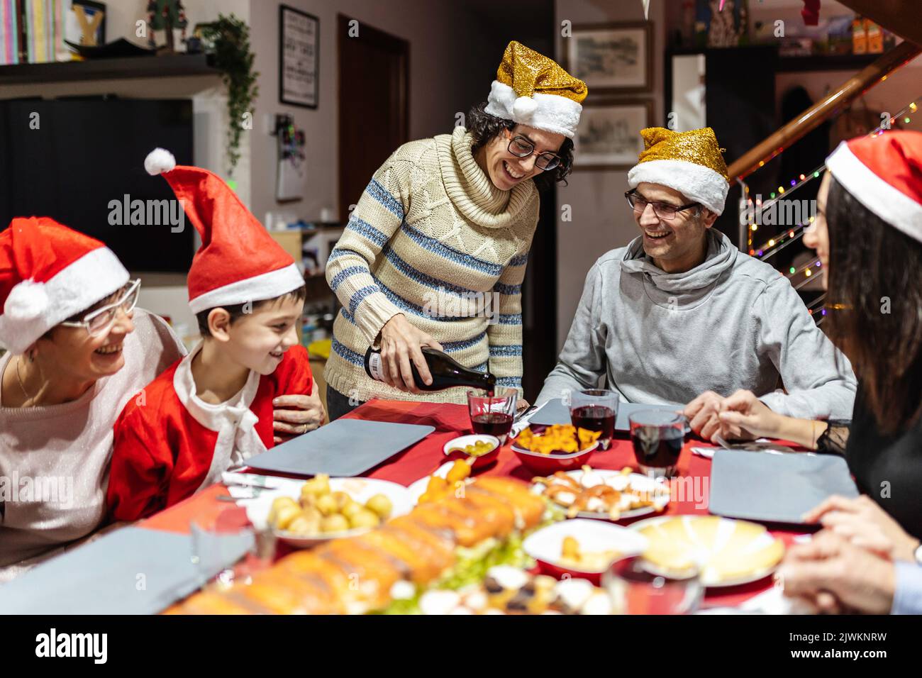 Happy hispanic family dinner hi-res stock photography and images - Alamy
