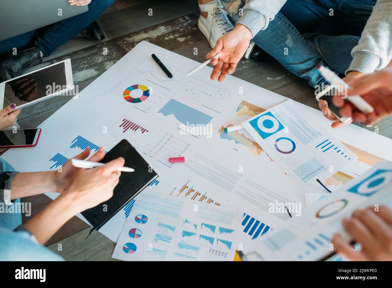 startup diagrams analysis team floor brainstorming Stock Photo - Alamy