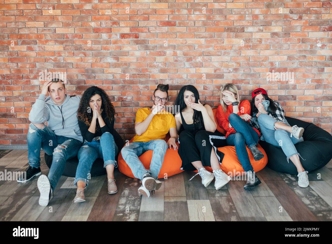 diverse millennials shock disgust negative emotion Stock Photo - Alamy