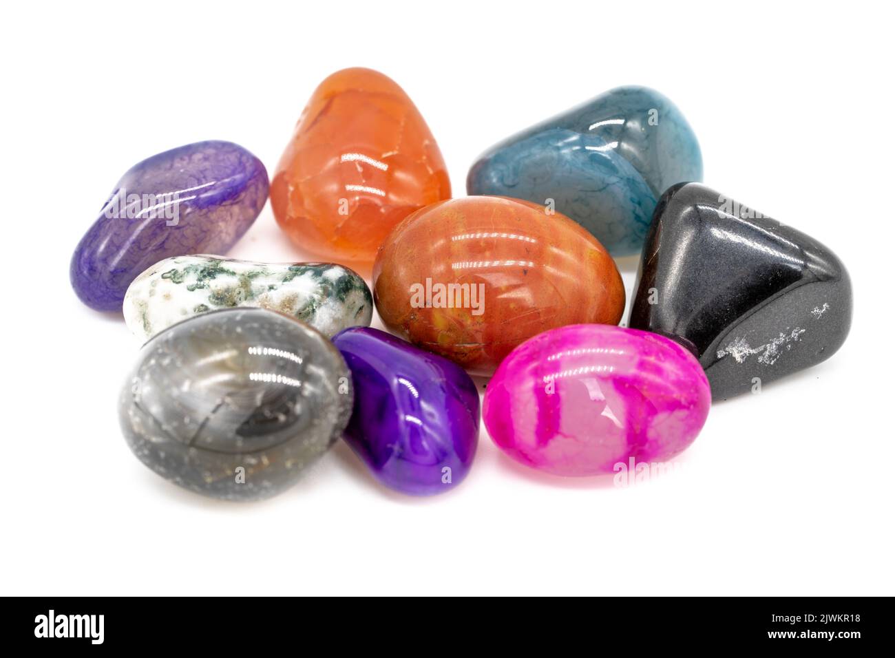 various healing gemstones isolated on white background Stock Photo - Alamy