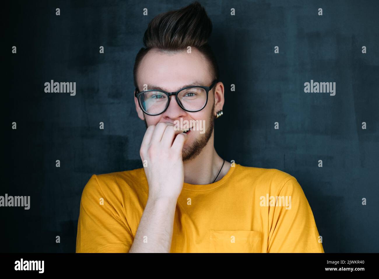 laughing ashamed emotional hipster guy portrait Stock Photo - Alamy