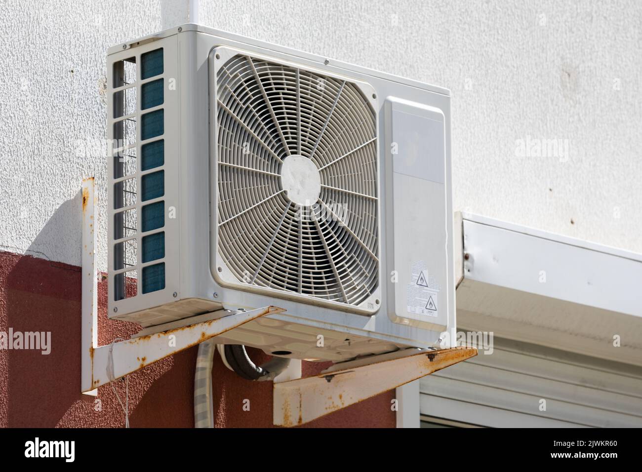 old air conditioning refrigeration unit outside the building Stock ...