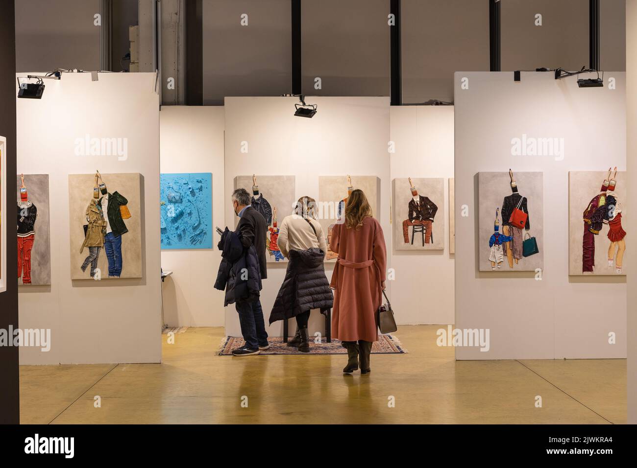 People Admiring Paintings in a Modern Art Gallery Stock Photo - Alamy