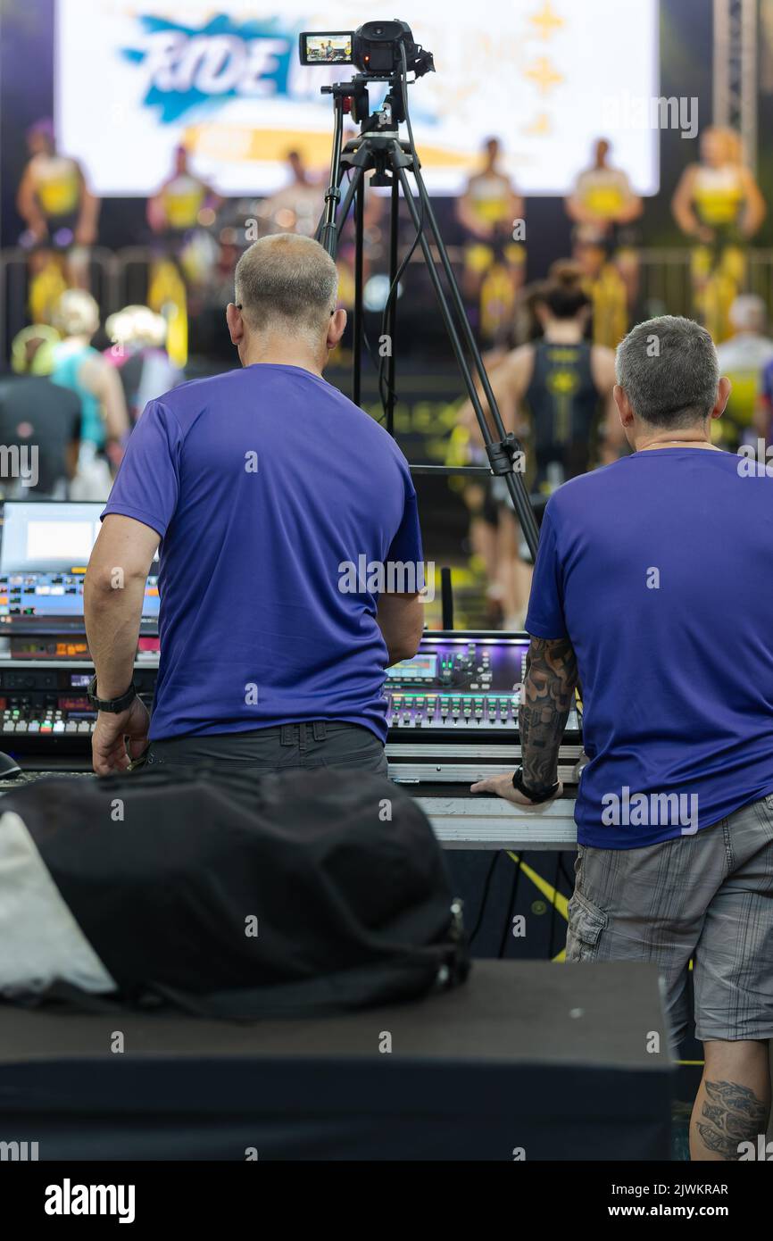 Lighting and Sound Technician and Broadcast Operator at Work in the ...