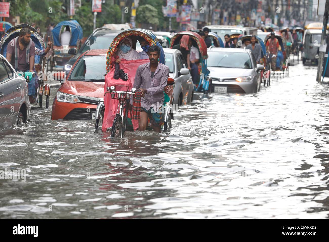 Dhaka, Bangladesh - September 06, 2022: Vehicles try to drive through ...