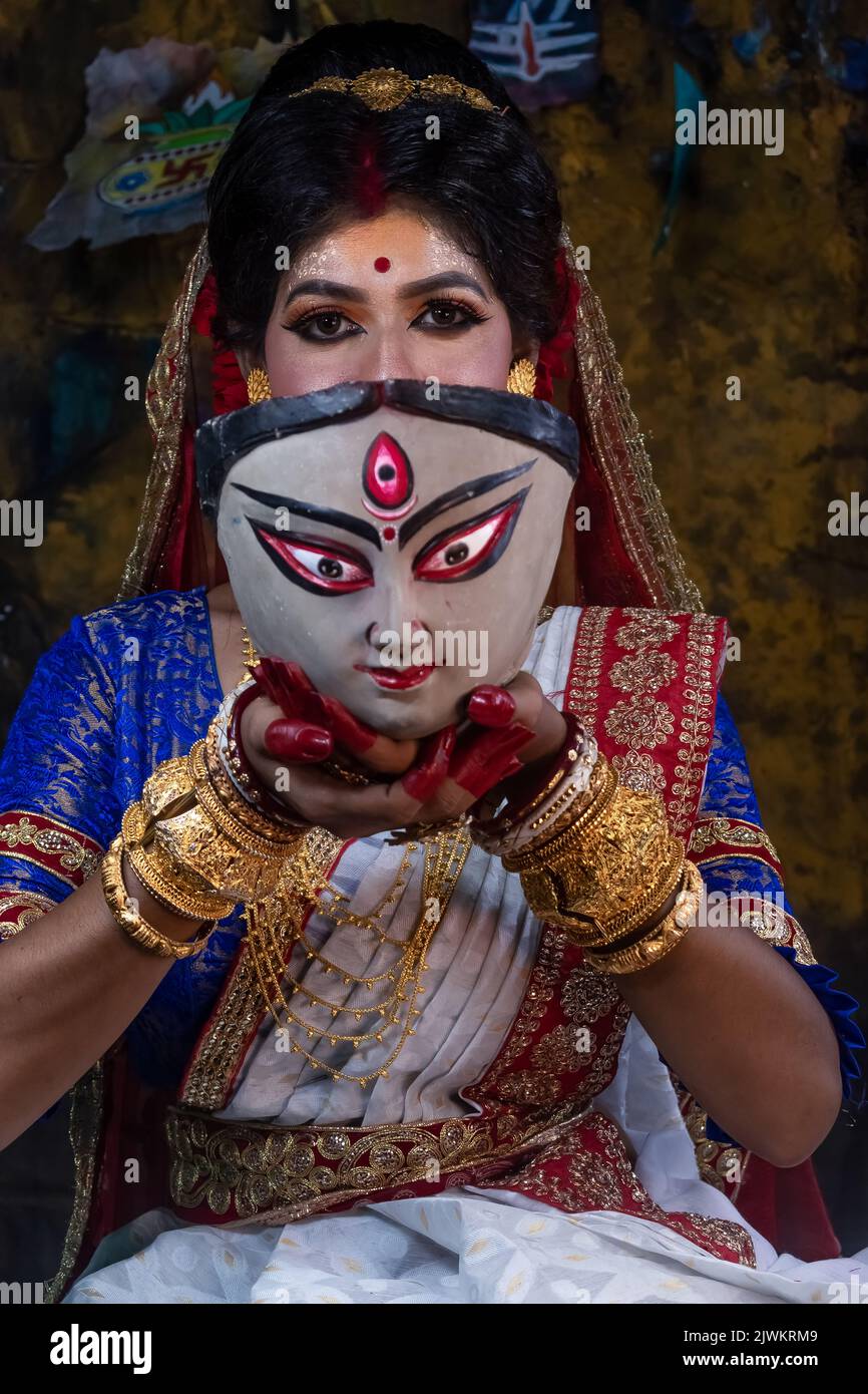 Agomoni concept photo shoot, A poses for the camera with an unfinished ...