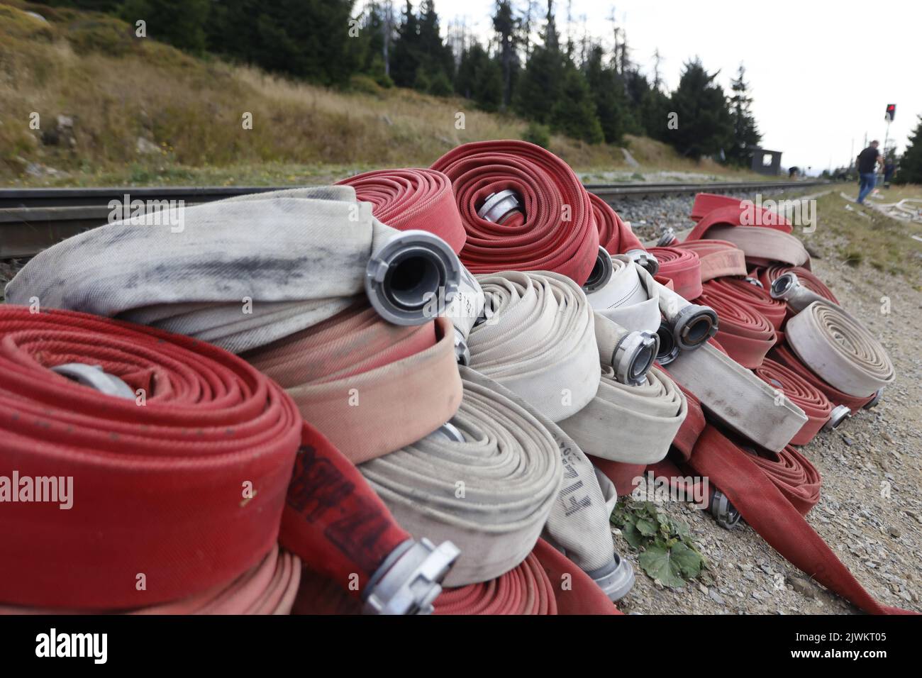 Schierke, Germany. 06th Sep, 2022. Fire hoses lie on the edge of the ...