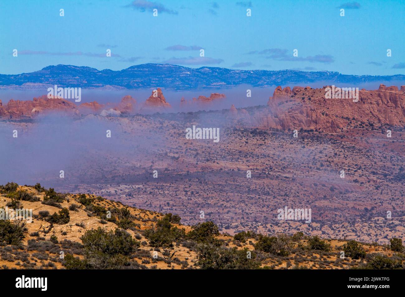 Ground fog in the Devil's Garden area of Arches National Park with the ...