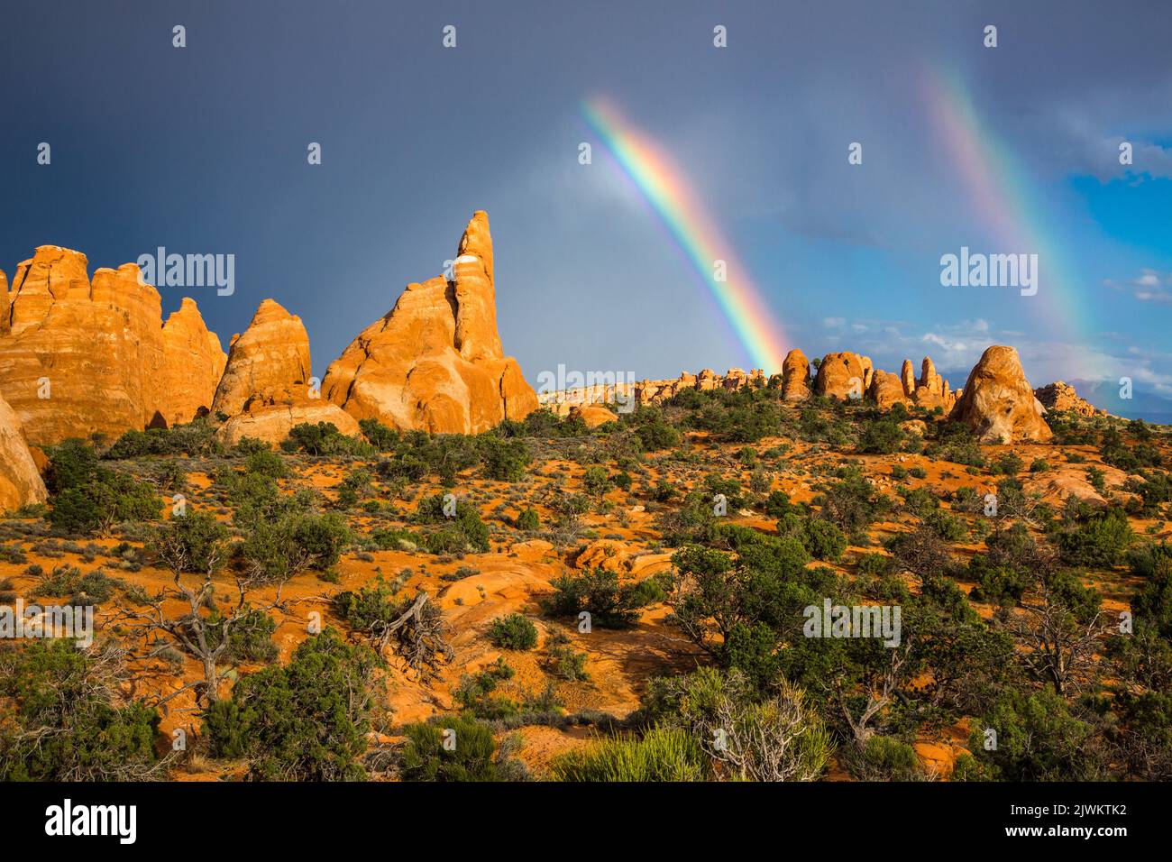 A partial rainbow with virga over Entrada sandstone fins in the Devil's ...