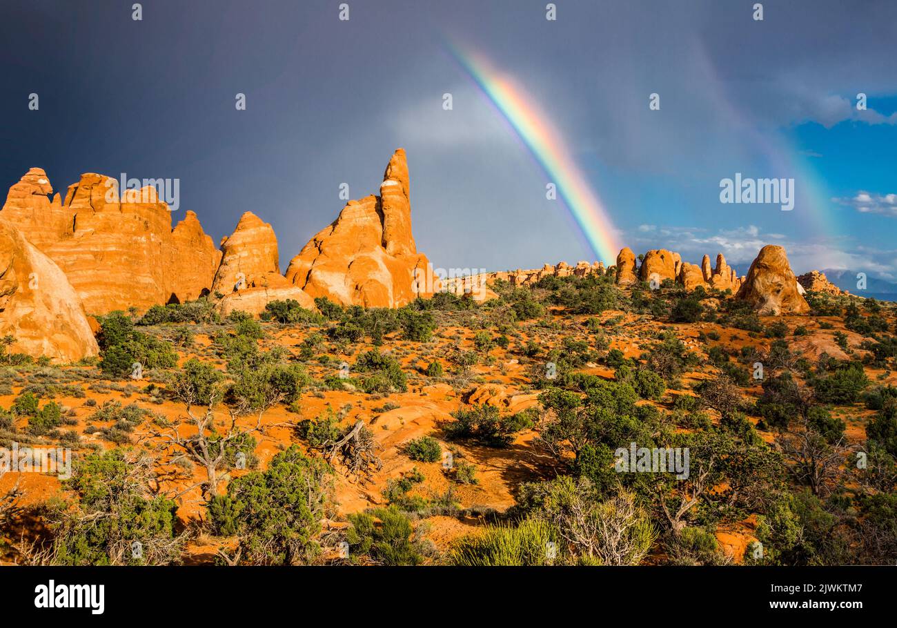 A partial rainbow with virga over Entrada sandstone fins in the Devil's ...