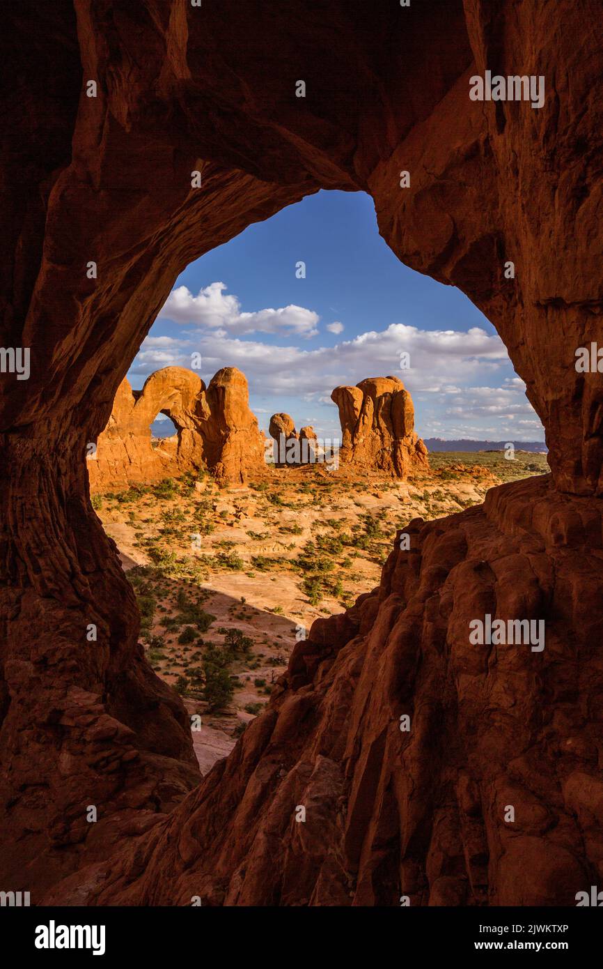The Parade of Elephants and the back of Double Arch framed by Cove Arch ...