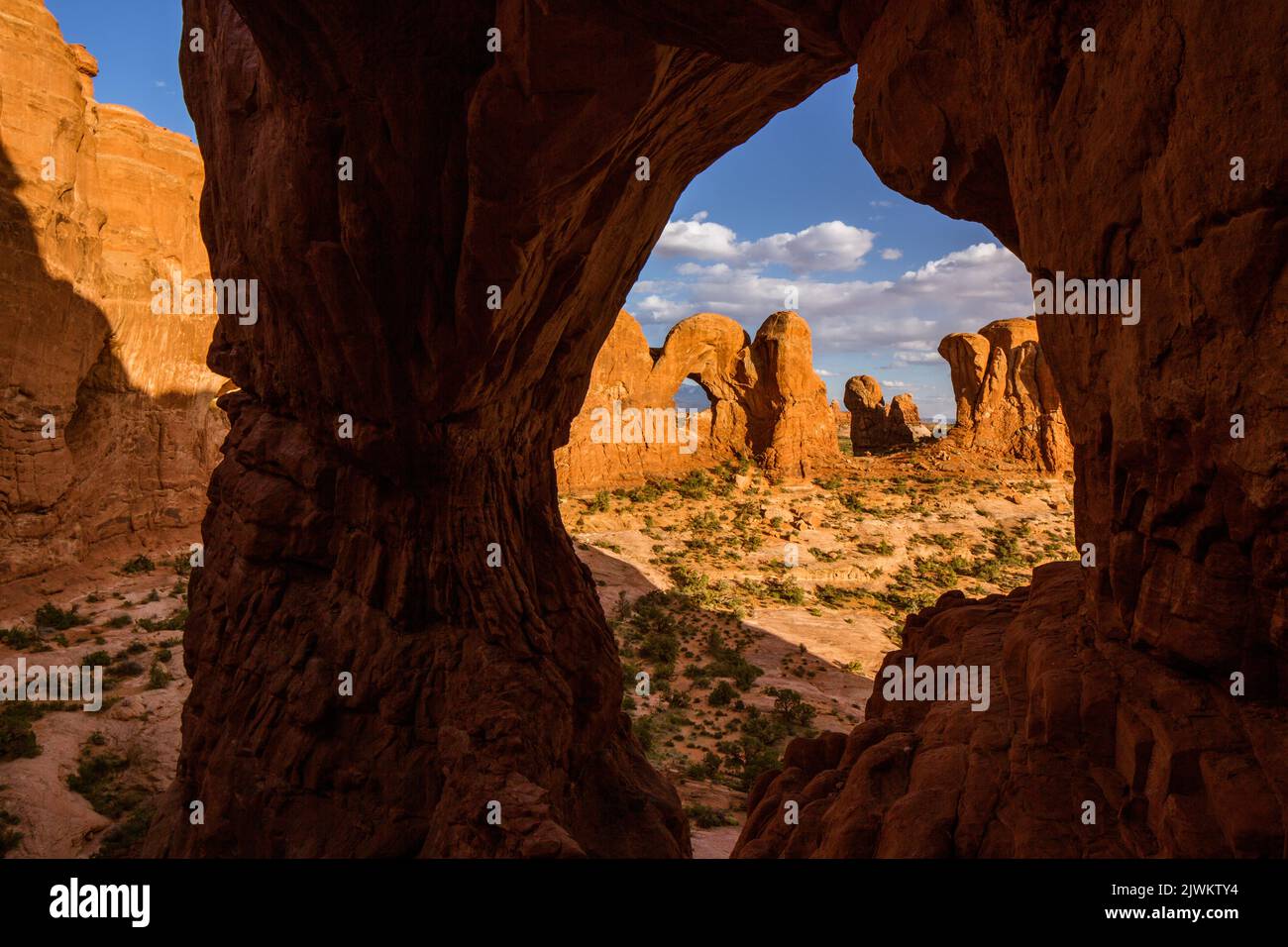 The back side of Double Arch framed by Cove Arch in the Cove of Caves ...