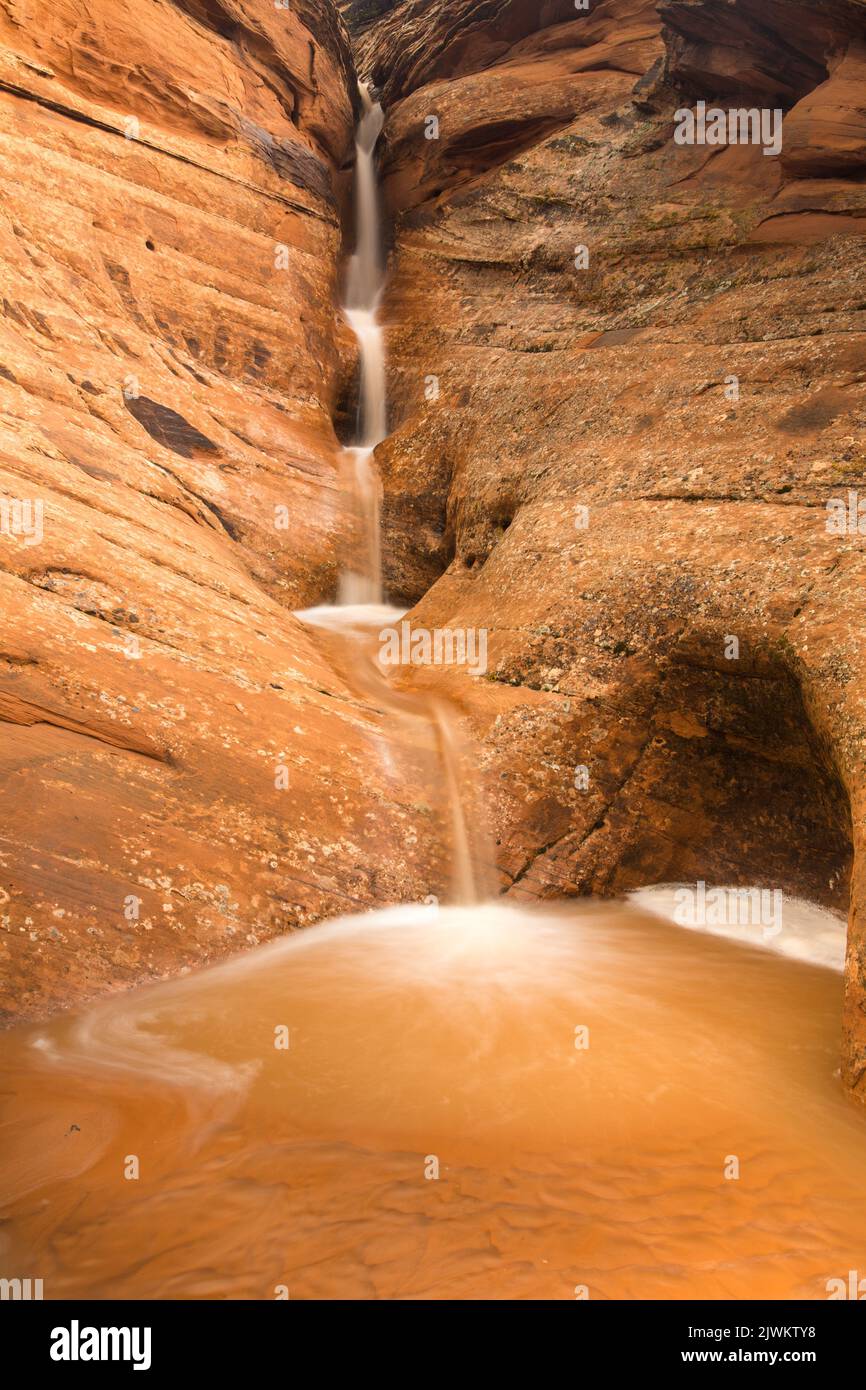 A small ephermeral waterfall on Elephant Butte after a rainstorm in ...