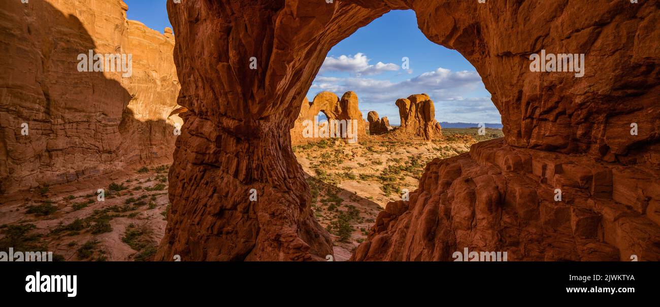 The Parade of Elephants and the back of Double Arch framed by Cove Arch ...