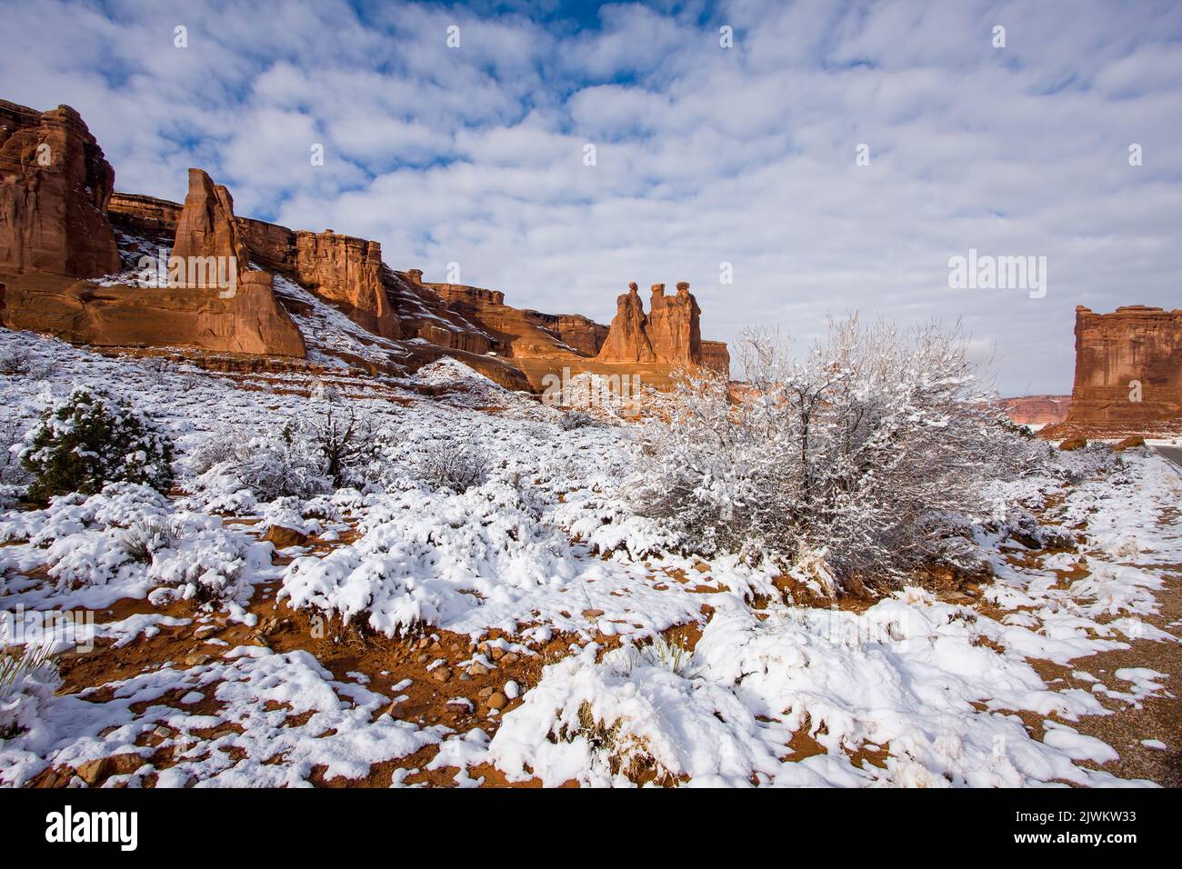 The hoodoos known as the Three Gossips in the Courthouse Towers with ...