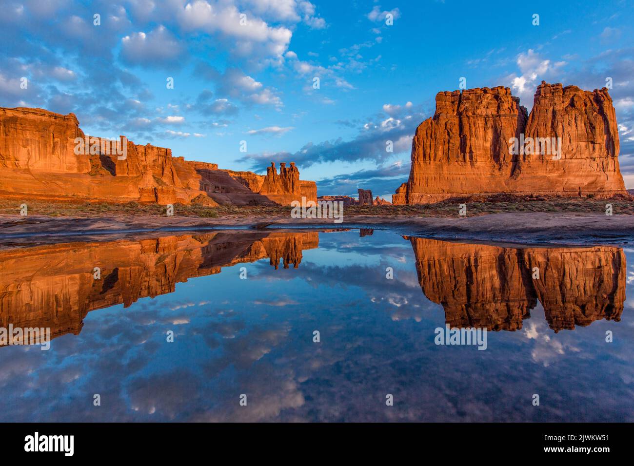The Three Gossips, Sheep Rock and the Organ reflected in an ephemeral ...